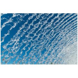 Wallario Sichtschutzzaunmatten Spritzendes Wasser vor blauem Himmel