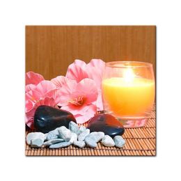 Bilderdepot24 Leinwandbild Gladiole mit Zensteinen und Kerze