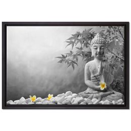 Pixxprint Leinwandbild Buddha mit Monoi Blüte in der Hand