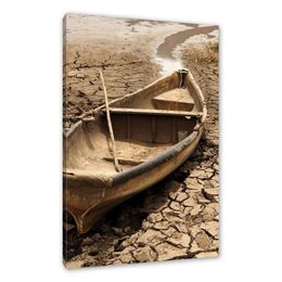 Pixxprint Leinwandbild Boot im ausgetrockneten See