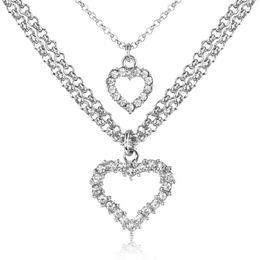 LUISIA® Kette mit Anhänger Doppel Halskette mit Herzanhängern und Kristallen von Swarovski® (1-tlg.
