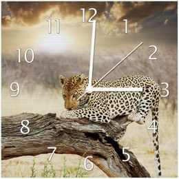 Wallario Wanduhr Leopard auf Baumstamm in Afrika (Aluverbunduhr), gelb, mit weißen Zeigern