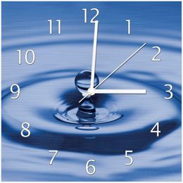 Wallario Wanduhr Wassertropfen im blauen Wasser (Aluverbunduhr), mit weißen Zeigern