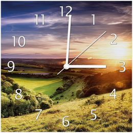 Wallario Wanduhr Farbenfroher Sonnenuntergang in England (Aluverbunduhr), gelb, mit weißen Zeigern
