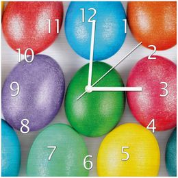 Wallario Wanduhr Bunte Oster-Eier in Nahaufnahme mit kräftigen Farben (Aluverbunduhr), blau, mit weißen Zeigern