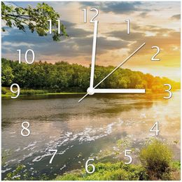 Wallario Wanduhr Sonnenuntergang am Fluss in grüner Umgebung (Aluverbunduhr), gelb, mit weißen Zeigern