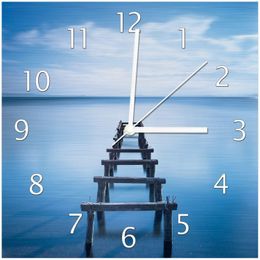Wallario Wanduhr Rustikaler Holzsteg im blauen See (Aluverbunduhr), mit weißen Zeigern