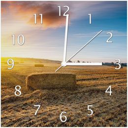 Wallario Wanduhr Stroh auf dem Feld bei untergehender Sonne (Aluverbunduhr), blau, mit weißen Zeigern