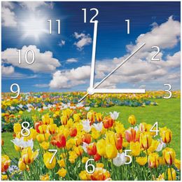 Wallario Wanduhr Tulpenwiese unter blauem Himmel (Aluverbunduhr), gelb, mit weißen Zeigern