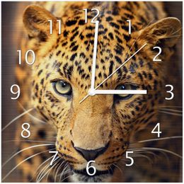 Wallario Wanduhr Leopard in Nahaufnahme beim Laufen (Aluverbunduhr), schwarz, mit weißen Zeigern