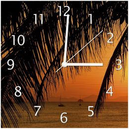 Wallario Wanduhr Sonnenuntergang unter Palmenblättern (Aluverbunduhr), schwarz, mit weißen Zeigern