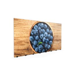 Primedeco Garderobenpaneel Magnetwand und Memoboard aus Glas Heidelbeeren in Holzschüssel