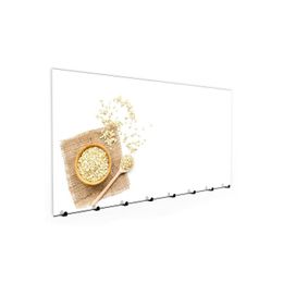 Primedeco Garderobenpaneel Magnetwand und Memoboard aus Glas Haferflocken auf Holzlöffel