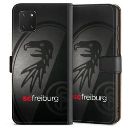 DeinDesign Handyhülle SC Freiburg Offizielles Lizenzprodukt Metallic Look, Samsung Galaxy Note 10 lite Hülle Handy Flip Case Wallet Cover, schwarz