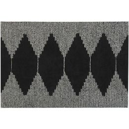 Beliani Teppich Schwarz / Weiß Baumwolle 140 x 200 cm geometrisches Muster handgewebt gefärbt Kurzhaar Kurzflor Bettvorleger Läufer Retro Stil - Schwarz