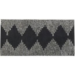 Beliani Teppich Schwarz / Weiß Baumwolle 80 x 150 cm geometrisches Muster handgewebt gefärbt Kurzhaar Kurzflor Bettvorleger Läufer Retro Stil - Schwarz