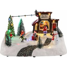 Spetebo - led Weihnachts Dorf Szene - the ski school - Beleuchtete Eisbahn mit fahrenden Figuren - Tischdeko Fensterdeko