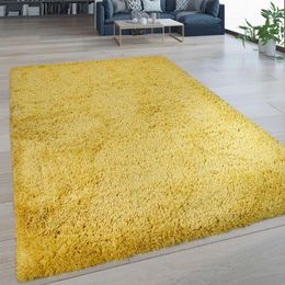 Hochflor Teppich Wohnzimmer Waschbar Rutschfest Flokati Optik Einfarbig In Gelb 80x150 cm - Paco Home