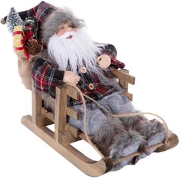 MyFlair Möbel & Accessoires Weihnachtsmann Weihnachtsdeko (1 St), auf einem Schlitten, Höhe ca. 24 cm, bunt|grau