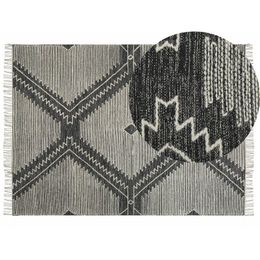 Beliani Teppich Schwarz/Weiß aus Baumwolle 140 x 200 cm geometrisches Muster Rechteckig Kurzflor im Boho-Stil Wohn- und Schlafzimmer - Weiß
