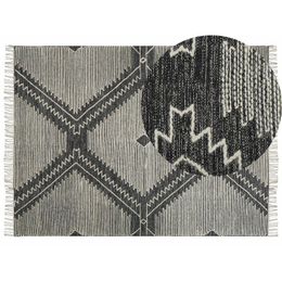 Beliani - Teppich Schwarz/Weiß aus Baumwolle 160 x 230 cm geometrisches Muster Rechteckig Kurzflor im Boho-Stil Wohn- und Schlafzimmer - Weiß