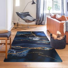 Teppich Goldene Glitzer Wellen vor Blau