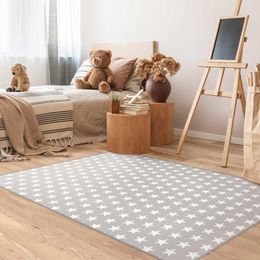 Teppich Weiße Sterne auf grauem Hintergrund