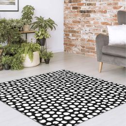 Teppich Weiße Tusche Polkadots auf Schwarz