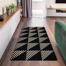 Teppich Schwarze Dreiecke und Streifen auf Beige
