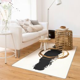 Teppich Abstrakte Formen - Gold und Schwarz