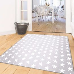 Teppich Weiße Sterne auf grauem Hintergrund