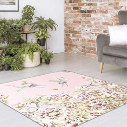 Teppich Aquarell Störche im Flug mit Rosen auf Rosa