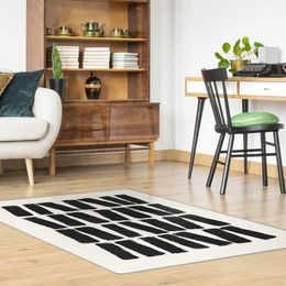 Teppich Schwarze Pinselstriche