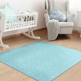 Teppich Gezeichnete kleine Punkte auf Pastellblau