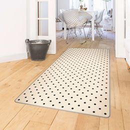 Teppich Schwarzes Punktemuster auf Beige