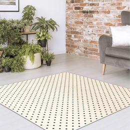 Teppich Schwarzes Punktemuster auf Beige
