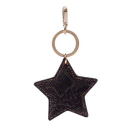 Gretchen Schlüsselanhänger Star Keyring, aus italienischem Kalbsleder, goldfarben|schwarz