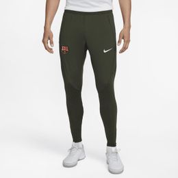 FC Barcelona Strike Nike Dri-FIT Herren-Fußballhose aus Strickmaterial - Grün