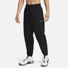 Nike Form vielseitige Hose mit schmal zulaufender Passform und für Herren - Schwarz