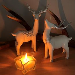 Online-Fuchs Dekofigur 2er Set edle Hirsche aus Keramik Rentiere Herbst- Weihnachtsdeko 180 (mit Ornamenten in Silber-Farbton), Maße (HxBxT) 27,5/21,5