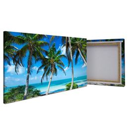 wandmotiv24 Leinwandbild Palmen an einem tropischen Strand