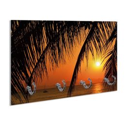 Wallario Schlüsselbrett Sonnenuntergang unter Palmenblättern