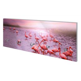 Wallario Wandgarderobe Rosa Flamingos bei Sonnenuntergang (1-teilig