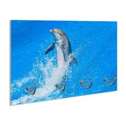 Wallario Schlüsselbrett Fröhlicher Delfin im blauen Wasser