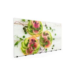 Primedeco Garderobenpaneel Magnetwand und Memoboard aus Glas Kuchen mit Avocado