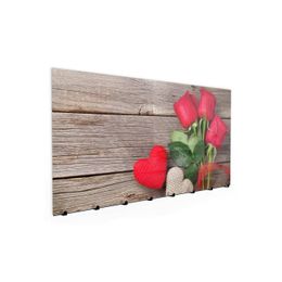 Primedeco Garderobenpaneel Magnetwand und Memoboard aus Glas Rosen auf Holztisch