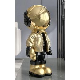Casa Padrino Skulptur Casa Padrino Luxus Designer Deko Skulptur Astronaut Gold / Schwarz 30 x H. 70 cm
