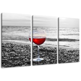 Pixxprint Leinwandbild Weinglas am Strand