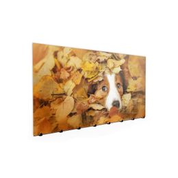 Primedeco Garderobenpaneel Magnetwand und Memoboard aus Glas Junger Hund in Herbstblätter