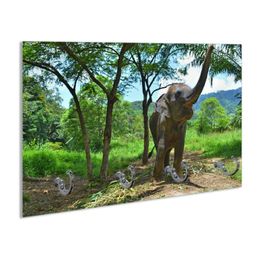 Wallario Handtuchhalter Junger Elefant im Dschungel